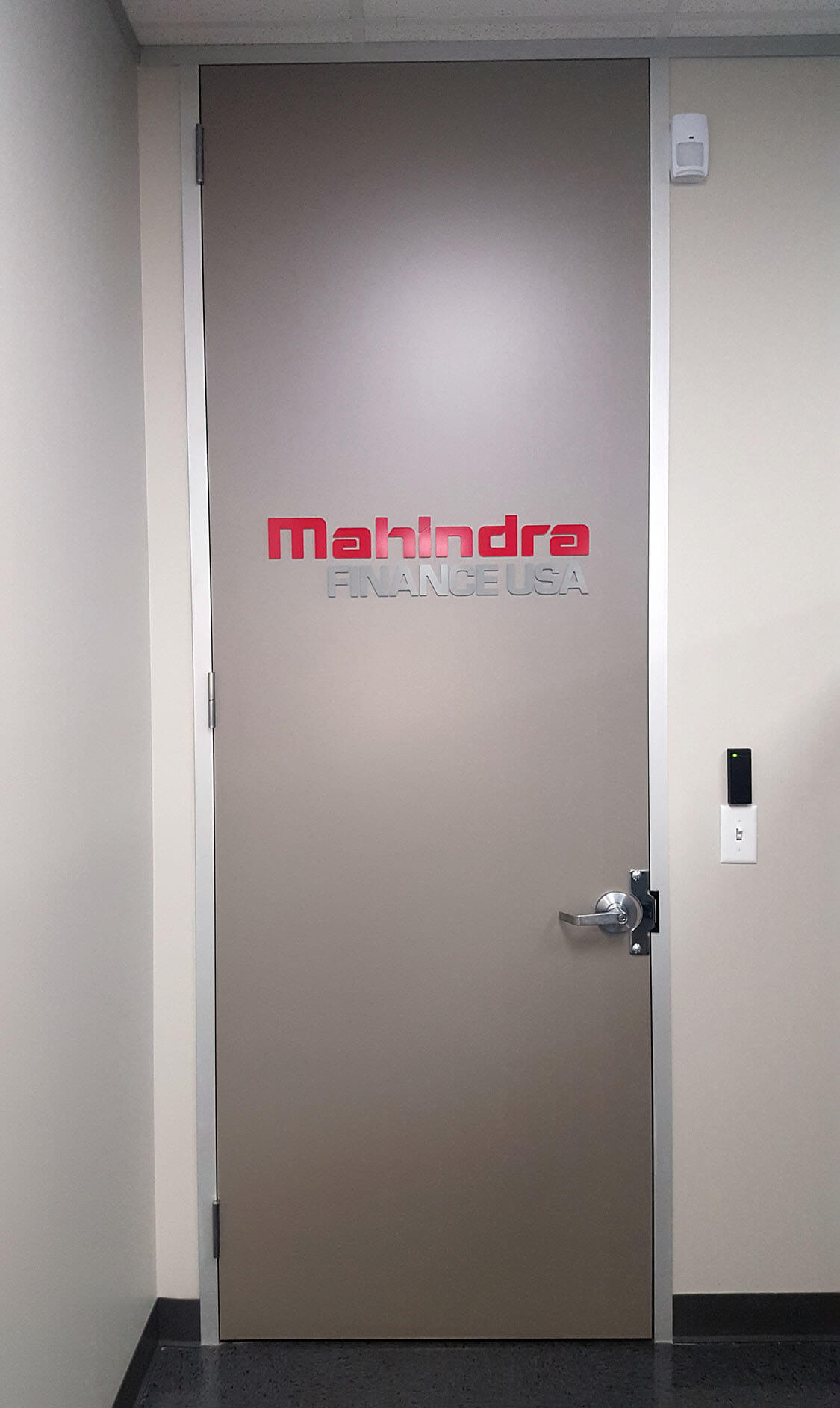 Mahindra-Finance-USA-_-Door-Lettering - Houston Sign Company