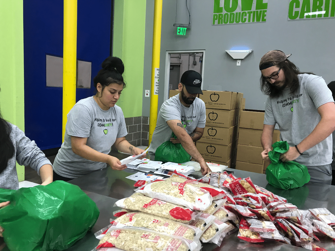 Making A Difference: Houston Sign Volunteers at the Houston Food Bank